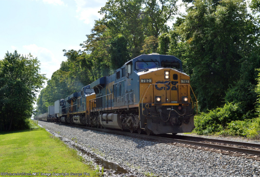 CSX 782 and train Q034